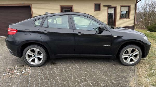 Black BMW X6 2011 in Trakai, with an engine capacity of 2.99 L and mileage of 342 thousand km for 11000 €, photo 9 on AUTOMOTO.COM.LV