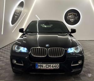 Black BMW X6 2011 in Marijampole, with an engine capacity of 2.99 L and mileage of 300 thousand km for 13450 €, photo 25 on AUTOMOTO.COM.LV
