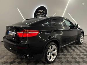 Black BMW X6 2011 in Marijampole, with an engine capacity of 2.99 L and mileage of 300 thousand km for 13450 €, photo 28 on AUTOMOTO.COM.LV