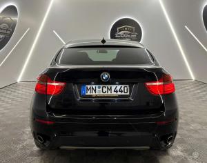 Black BMW X6 2011 in Marijampole, with an engine capacity of 2.99 L and mileage of 300 thousand km for 13450 €, photo 30 on AUTOMOTO.COM.LV