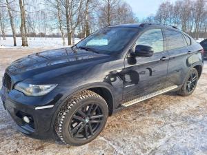 Black BMW X6 2011 in Riga, with an engine capacity of 3.00 L and mileage of 274 thousand km for 13500 €, photo  on AUTOMOTO.COM.LV