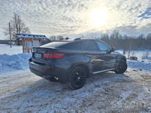 Black BMW X6 2011 in Riga, with an engine capacity of 3.00 L and mileage of 274 thousand km for 13500 €, photo 2 on AUTOMOTO.COM.LV
