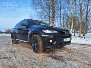Black BMW X6 2011 in Riga, with an engine capacity of 3.00 L and mileage of 274 thousand km for 13500 €, photo 4 on AUTOMOTO.COM.LV