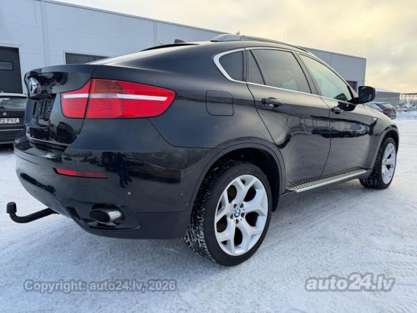 Black BMW X6 2011 in Tartu, with an engine capacity of 3.00 L and mileage of 220 thousand km for 13999 €, photo 3 on AUTOMOTO.COM.LV