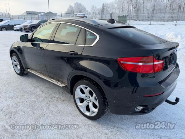 Black BMW X6 2011 in Tartu, with an engine capacity of 3.00 L and mileage of 220 thousand km for 13999 €, photo 4 on AUTOMOTO.COM.LV