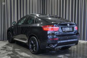 Black BMW X6 2011 in Marijampole, with an engine capacity of 2.99 L and mileage of 177 thousand km for 13950 €, photo 8 on AUTOMOTO.COM.LV