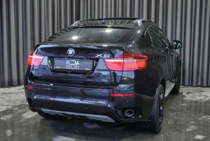 Black BMW X6 2011 in Marijampole, with an engine capacity of 2.99 L and mileage of 177 thousand km for 13950 €, photo 11 on AUTOMOTO.COM.LV