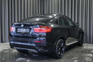 Black BMW X6 2011 in Marijampole, with an engine capacity of 3.00 L and mileage of 177 thousand km for 13950 €, photo 12 on AUTOMOTO.COM.LV