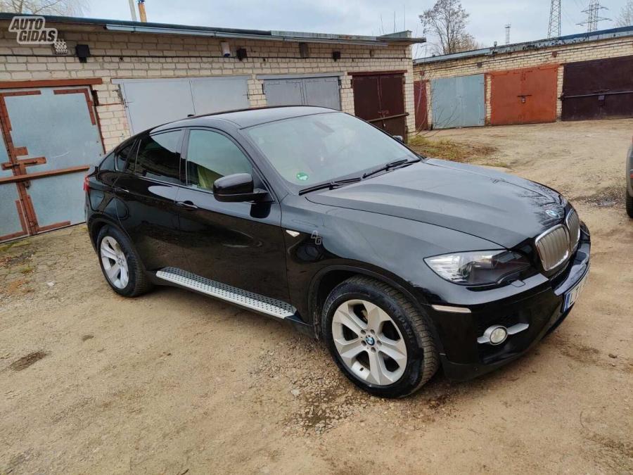 Black BMW X6 2011 in Marijampole, with an engine capacity of 3.00 L and mileage of 284 thousand km for 15200 €, photo 4 on AUTOMOTO.COM.LV