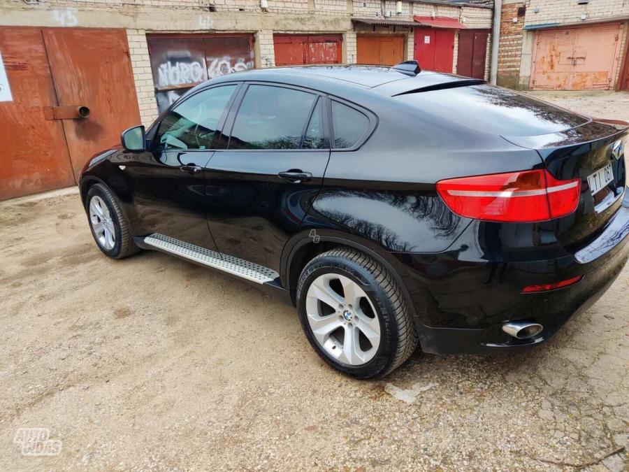 Black BMW X6 2011 in Marijampole, with an engine capacity of 3.00 L and mileage of 284 thousand km for 15200 €, photo 5 on AUTOMOTO.COM.LV