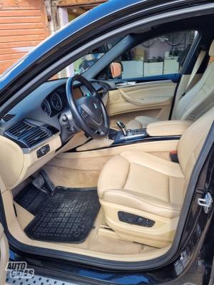 Black BMW X6 2011 in Marijampole, with an engine capacity of 3.00 L and mileage of 284 thousand km for 15200 €, photo 8 on AUTOMOTO.COM.LV