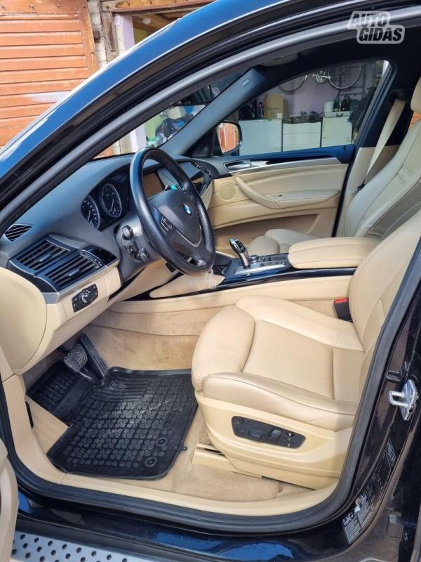 Black BMW X6 2011 in Marijampole, with an engine capacity of 3.00 L and mileage of 284 thousand km for 15000 €, photo 8 on AUTOMOTO.COM.LV