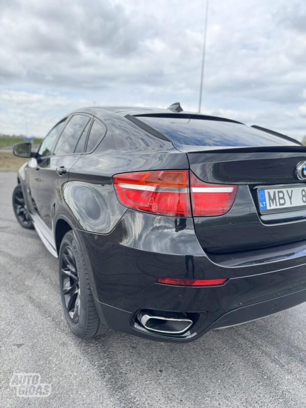 Melns BMW X6 2011 Panevēža, ar dzinēja tilpumu 3.00 L un nobraukumu 317 tūkst. km par 13000 €, foto 5 vietnē AUTOMOTO.COM.LV