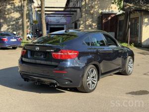 Melns BMW X6 2011 Rīga, ar dzinēja tilpumu 4.40 L un nobraukumu 322 tūkst. km par 9950 €, foto  vietnē AUTOMOTO.COM.LV