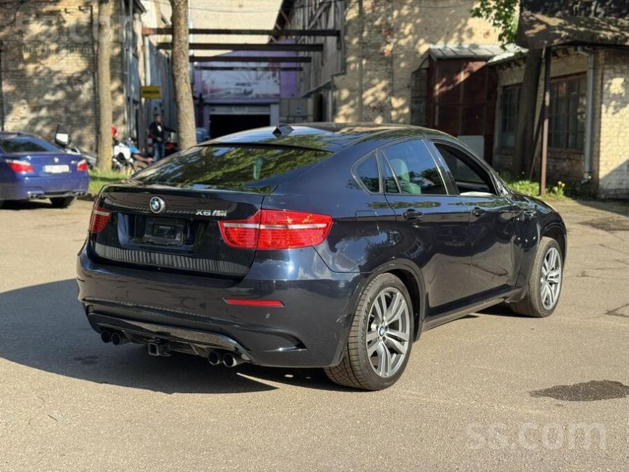 Black BMW X6 2011 in Riga, with an engine capacity of 4.40 L and mileage of 322 thousand km for 9950 €, photo 1 on AUTOMOTO.COM.LV