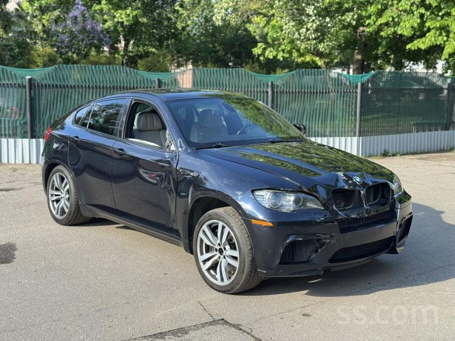 Black BMW X6 2011 in Riga, with an engine capacity of 4.40 L and mileage of 322 thousand km for 9950 €, photo 6 on AUTOMOTO.COM.LV