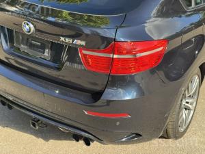 Black BMW X6 2011 in Riga, with an engine capacity of 4.40 L and mileage of 322 thousand km for 9950 €, photo 8 on AUTOMOTO.COM.LV