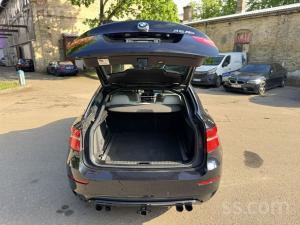 Black BMW X6 2011 in Riga, with an engine capacity of 4.40 L and mileage of 322 thousand km for 9950 €, photo 10 on AUTOMOTO.COM.LV