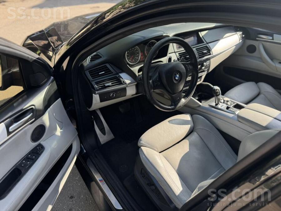 Black BMW X6 2011 in Riga, with an engine capacity of 4.40 L and mileage of 322 thousand km for 9950 €, photo 12 on AUTOMOTO.COM.LV