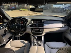 Black BMW X6 2011 in Riga, with an engine capacity of 4.40 L and mileage of 322 thousand km for 9950 €, photo 14 on AUTOMOTO.COM.LV