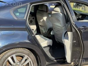 Black BMW X6 2011 in Riga, with an engine capacity of 4.40 L and mileage of 322 thousand km for 9950 €, photo 16 on AUTOMOTO.COM.LV
