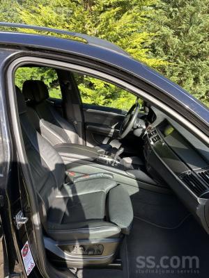 Melns BMW X6 2011 Daugavpils, ar dzinēja tilpumu 3.00 L un nobraukumu 203 tūkst. km par 14000 €, foto 14 vietnē AUTOMOTO.COM.LV