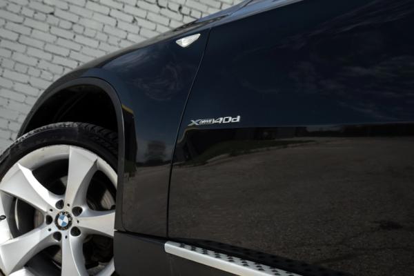 Black BMW X6 2011 in Riga, with an engine capacity of 4.00 L and mileage of 260 thousand km for 15890 €, photo 8 on AUTOMOTO.COM.LV