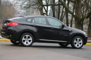 Black BMW X6 2011 in Riga, with an engine capacity of 3.00 L and mileage of 265 thousand km for 12790 €, photo 7 on AUTOMOTO.COM.LV