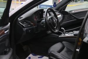 Black BMW X6 2011 in Riga, with an engine capacity of 3.00 L and mileage of 265 thousand km for 12790 €, photo 8 on AUTOMOTO.COM.LV