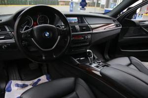 Black BMW X6 2011 in Riga, with an engine capacity of 3.00 L and mileage of 265 thousand km for 12790 €, photo 11 on AUTOMOTO.COM.LV
