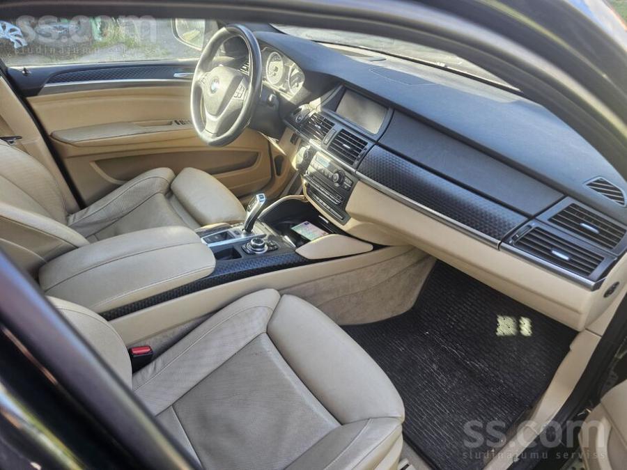 Black BMW X6 2011 in Riga, with an engine capacity of 3.00 L and mileage of 339 thousand km for 6999 €, photo 5 on AUTOMOTO.COM.LV