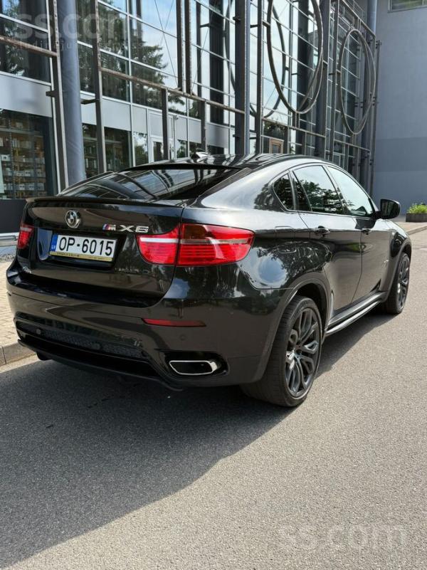 Black BMW X6 2011 in Riga, with an engine capacity of 3.00 L and mileage of 0 thousand km for 12500 €, photo 4 on AUTOMOTO.COM.LV