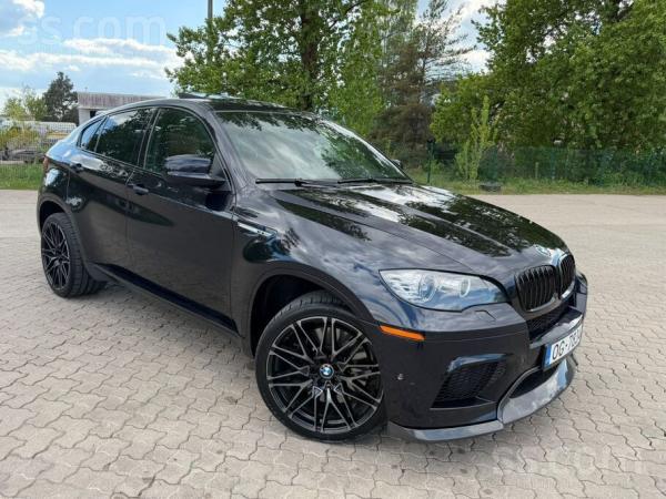 Black BMW X6 2011 in Riga, with an engine capacity of 4.40 L and mileage of 220 thousand km for 17900 €, photo 4 on AUTOMOTO.COM.LV