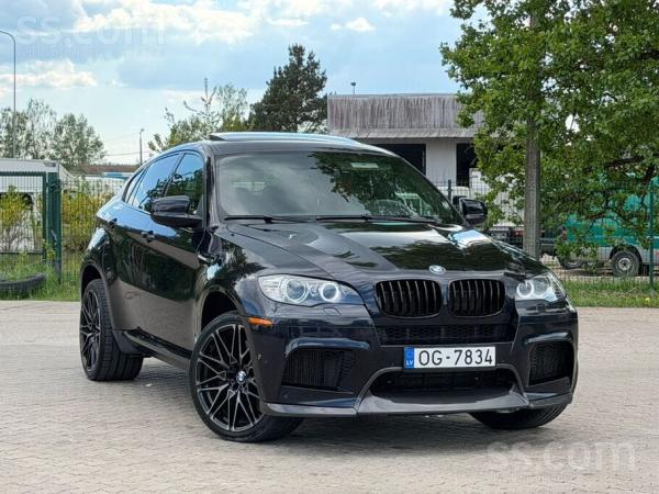 Black BMW X6 2011 in Riga, with an engine capacity of 4.40 L and mileage of 220 thousand km for 17900 €, photo 5 on AUTOMOTO.COM.LV