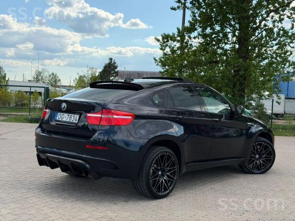Black BMW X6 2011 in Riga, with an engine capacity of 4.40 L and mileage of 220 thousand km for 17900 €, photo 7 on AUTOMOTO.COM.LV