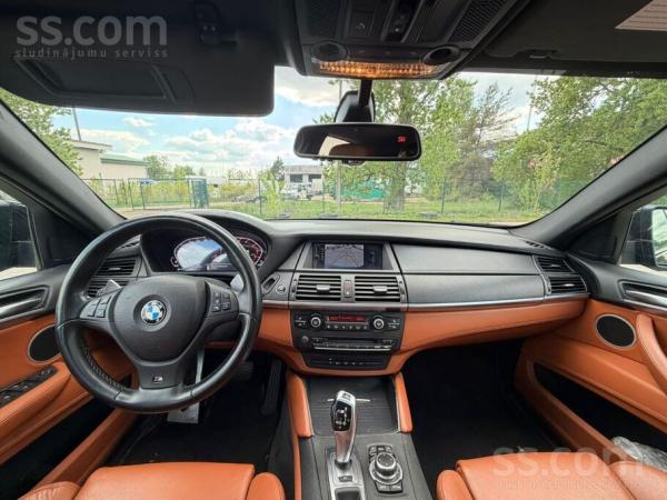 Black BMW X6 2011 in Riga, with an engine capacity of 4.40 L and mileage of 220 thousand km for 17900 €, photo 9 on AUTOMOTO.COM.LV
