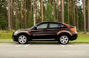 Black BMW X6 2011 in Riga, with an engine capacity of 3.00 L and mileage of 230 thousand km for 12190 €, photo 5 on AUTOMOTO.COM.LV