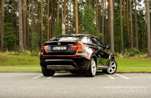 Black BMW X6 2011 in Riga, with an engine capacity of 3.00 L and mileage of 230 thousand km for 12190 €, photo 6 on AUTOMOTO.COM.LV