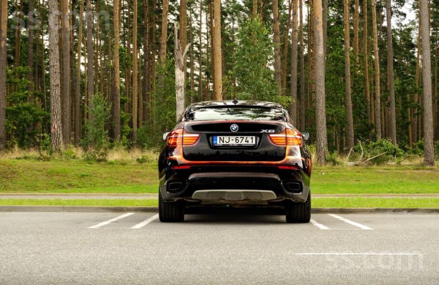 Black BMW X6 2011 in Riga, with an engine capacity of 3.00 L and mileage of 230 thousand km for 12190 €, photo 7 on AUTOMOTO.COM.LV