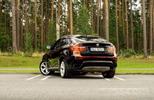Black BMW X6 2011 in Riga, with an engine capacity of 3.00 L and mileage of 230 thousand km for 12190 €, photo 8 on AUTOMOTO.COM.LV
