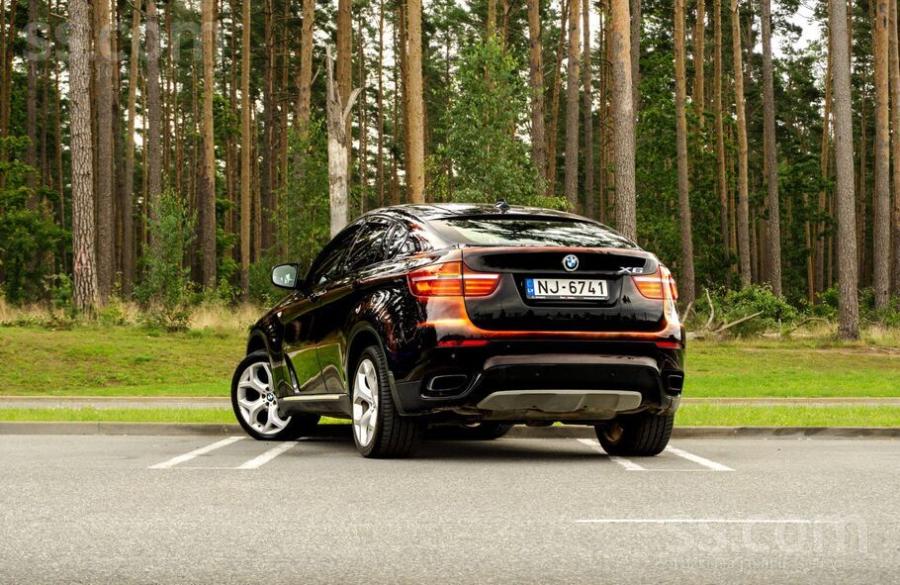 Black BMW X6 2011 in Riga, with an engine capacity of 3.00 L and mileage of 230 thousand km for 12190 €, photo 8 on AUTOMOTO.COM.LV