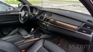 Black BMW X6 2011 in Riga, with an engine capacity of 3.00 L and mileage of 230 thousand km for 12190 €, photo 11 on AUTOMOTO.COM.LV