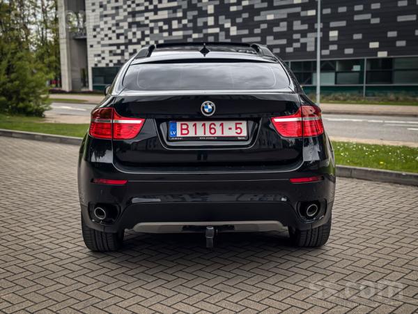 Black BMW X6 2012 in Jelgava, with an engine capacity of 3.00 L and mileage of 0 thousand km for 10000 €, photo 4 on AUTOMOTO.COM.LV