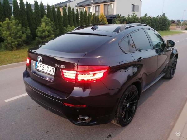 Black BMW X6 2012 in Vilnius, with an engine capacity of 3.00 L and mileage of 500 thousand km for 10300 €, photo 6 on AUTOMOTO.COM.LV