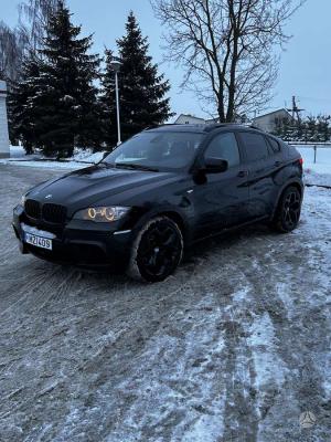 Black BMW X6 2012 in Marijampole, with an engine capacity of 2.99 L and mileage of 233 thousand km for 14800 €, photo  on AUTOMOTO.COM.LV