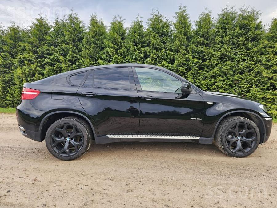 Black BMW X6 2012 in Jelgava, with an engine capacity of 3.00 L and mileage of 257 thousand km for 12800 €, photo 4 on AUTOMOTO.COM.LV