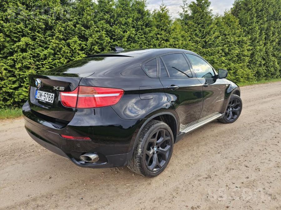 Black BMW X6 2012 in Jelgava, with an engine capacity of 3.00 L and mileage of 257 thousand km for 12800 €, photo 6 on AUTOMOTO.COM.LV