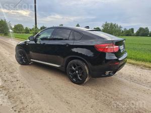Black BMW X6 2012 in Jelgava, with an engine capacity of 3.00 L and mileage of 257 thousand km for 12800 €, photo 7 on AUTOMOTO.COM.LV
