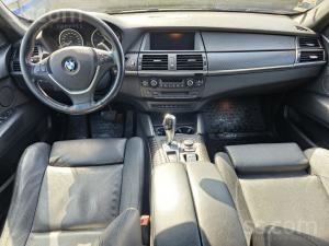 Black BMW X6 2012 in Jelgava, with an engine capacity of 3.00 L and mileage of 257 thousand km for 12800 €, photo 15 on AUTOMOTO.COM.LV