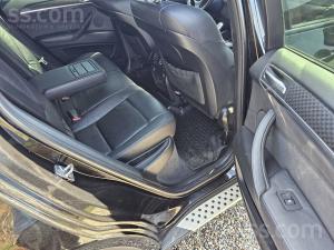 Black BMW X6 2012 in Jelgava, with an engine capacity of 3.00 L and mileage of 257 thousand km for 12800 €, photo 20 on AUTOMOTO.COM.LV